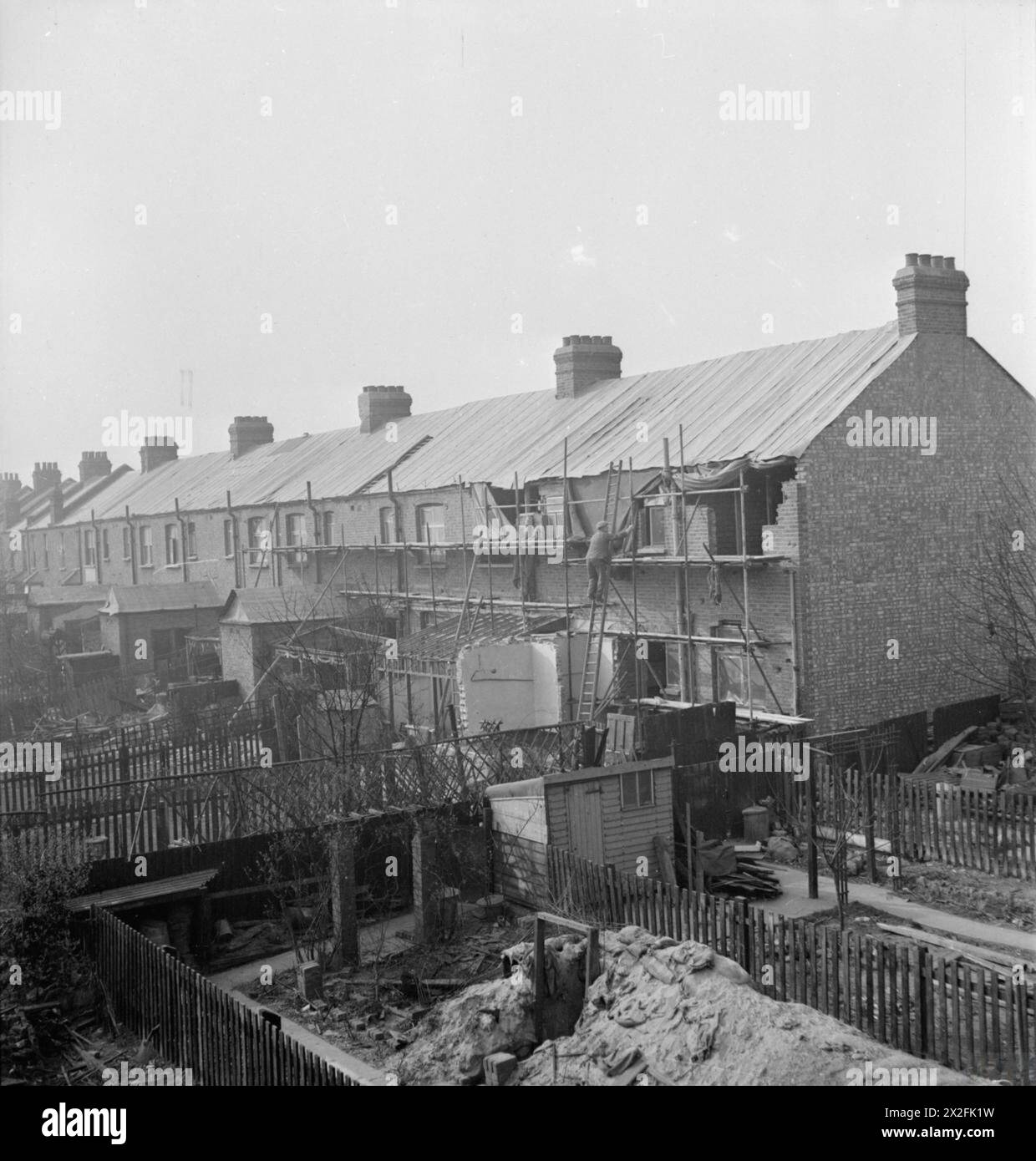 A terrace of bomb-damaged houses in Britain is undergoing ...