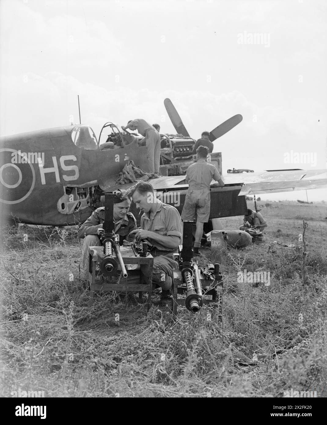 A North American Mustang Mark III of No. 260 Squadron RAF is serviced ...