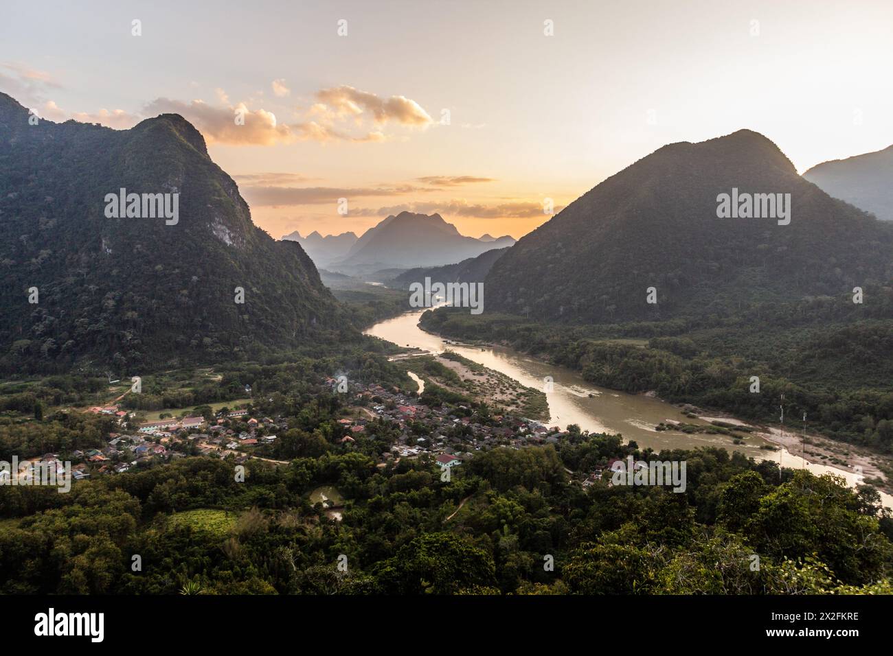 Sunset aerial view of Muang Ngoi Neua village and Nam Ou river from ...