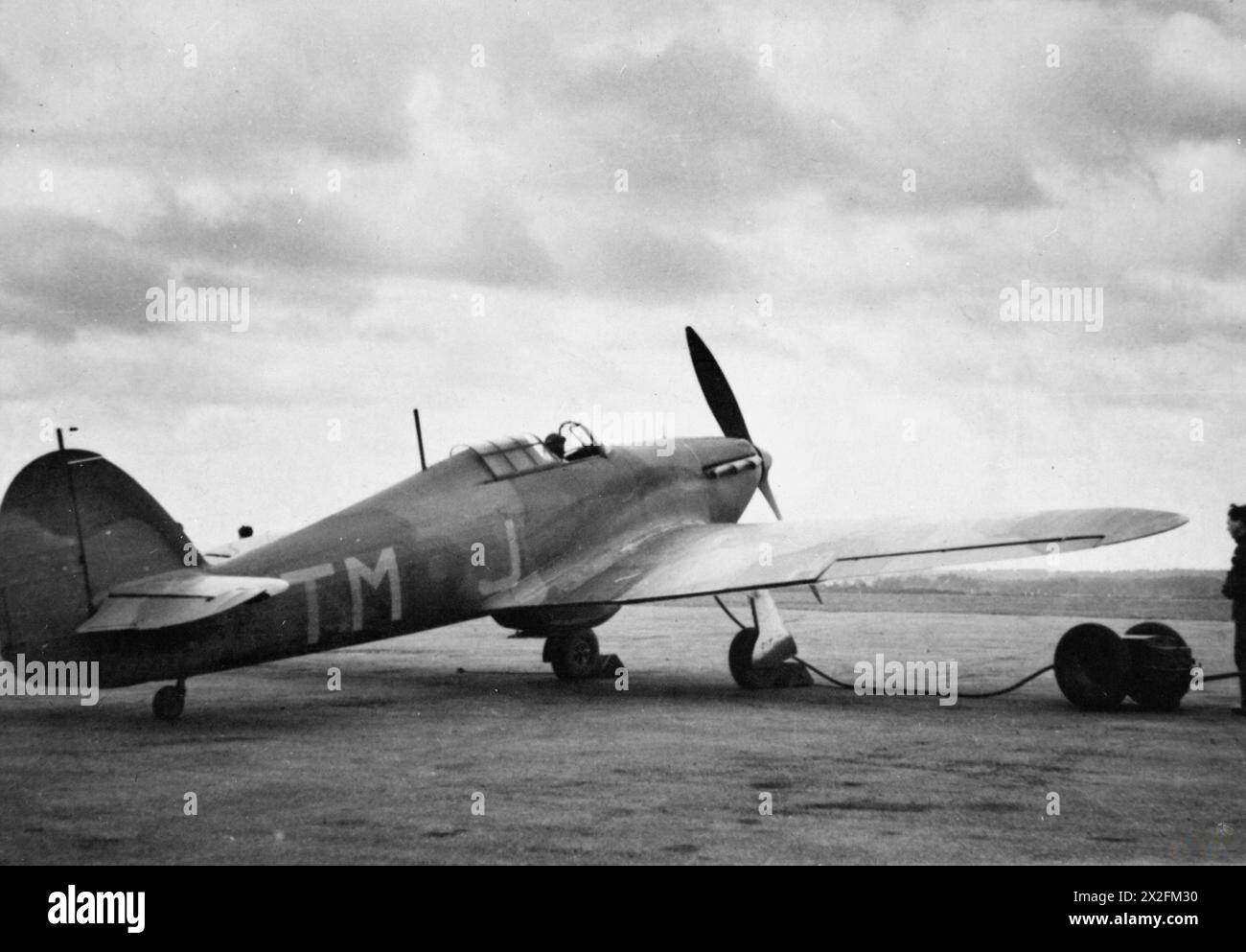 A Hawker Hurricane being refuelled, illustrating the aircraft used by ...
