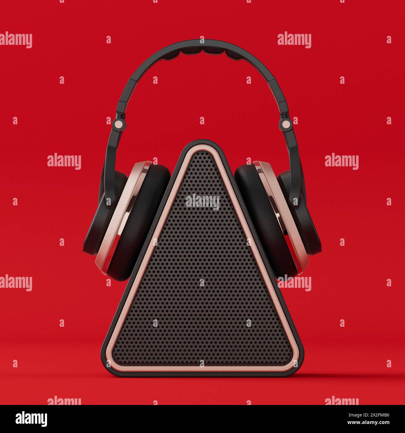 Modern Triangular Mobile Music Speaker with Headphones on a red ...