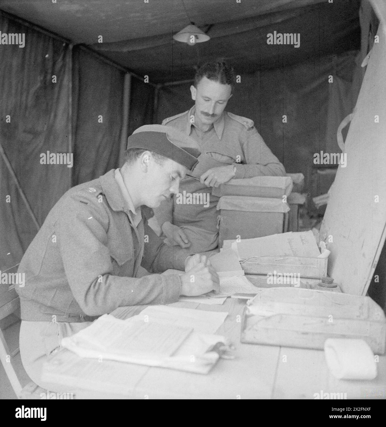 Cecil Beaton photographed military officers engaged in operations in ...