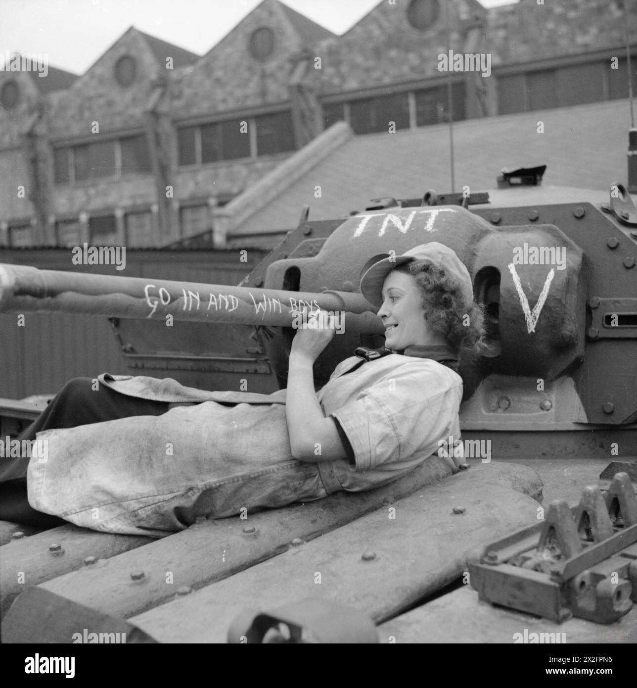 A 1942 photograph showing a woman worker at the B.T.H. factory in ...
