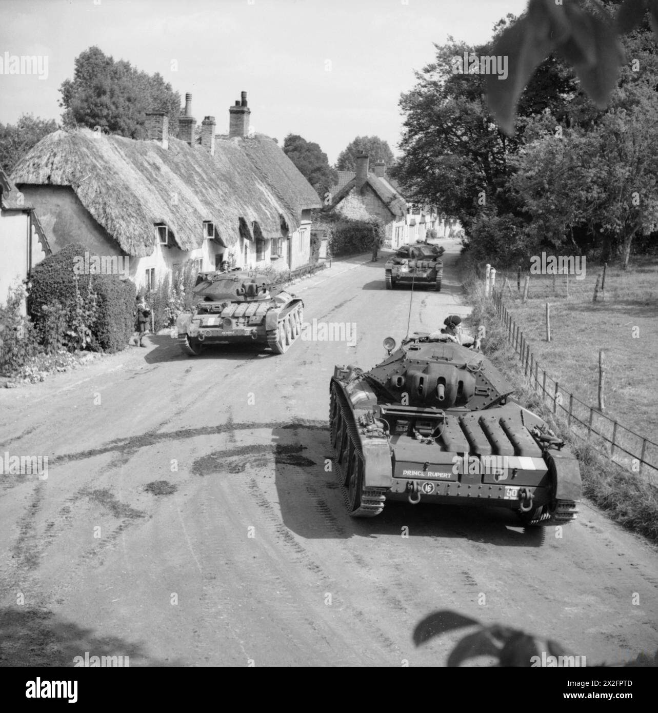 THE BRITISH ARMY IN THE UNITED KINGDOM 1939-45 - Covenanter tanks pass ...