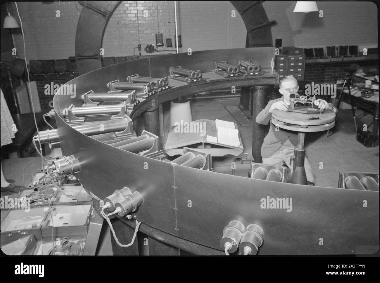 A scientist in the Optics Section at the National Physical Laboratory ...