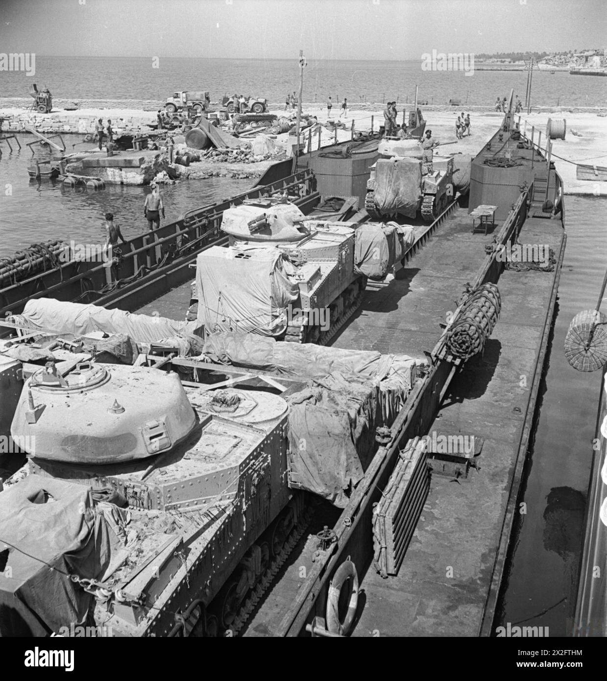Grant tanks, including flail variants, of the British Army embarked ...