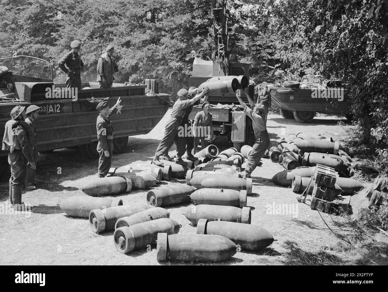 BOMBS FOR R.A.F. ARRIVE BEHIND NORMANDY FRONT - RAF and bombs Stock ...