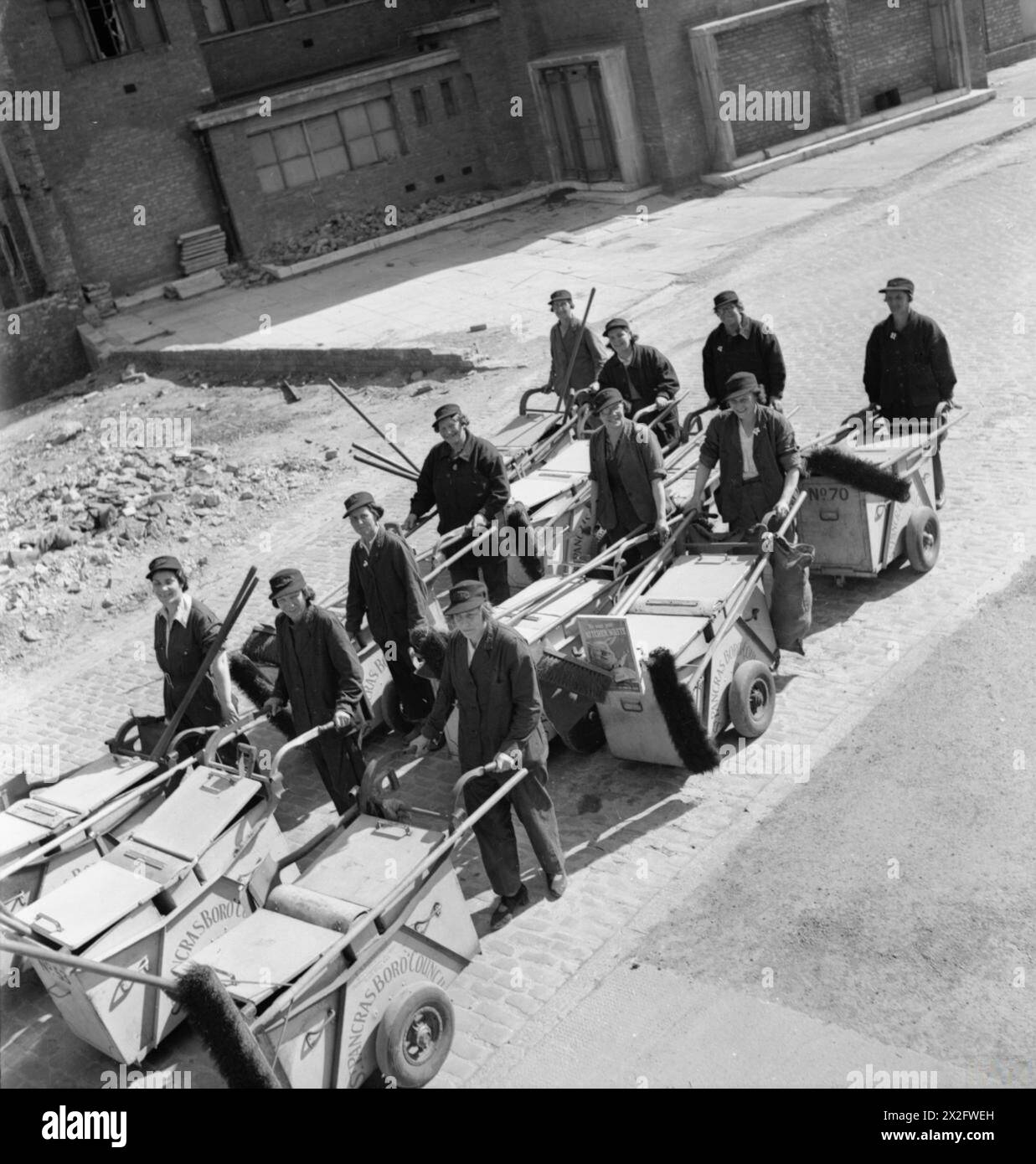 WOMEN'S STREET CLEANING BRIGADE: FEMALE DUSTMEN AT WORK, LONDON, 1942 ...