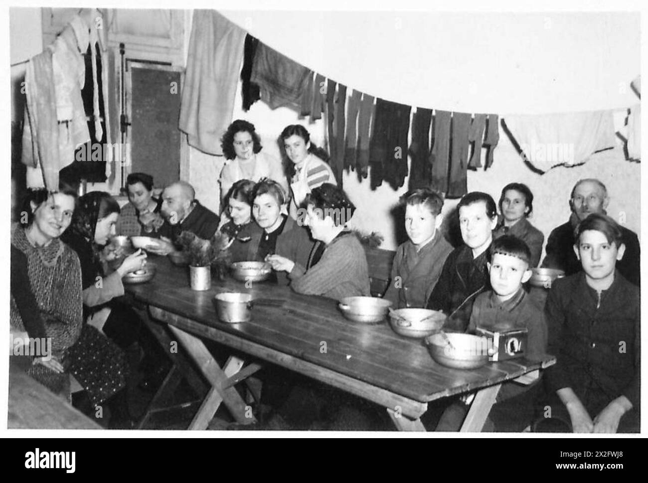 "Civilians evacuated from British-occupied Germany have meal time in ...
