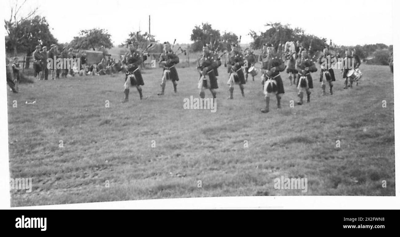 HIGHLAND BANDS PLAY IN MUIDS AND LE THUIT - Pipe Major R.E. Nicol leads ...