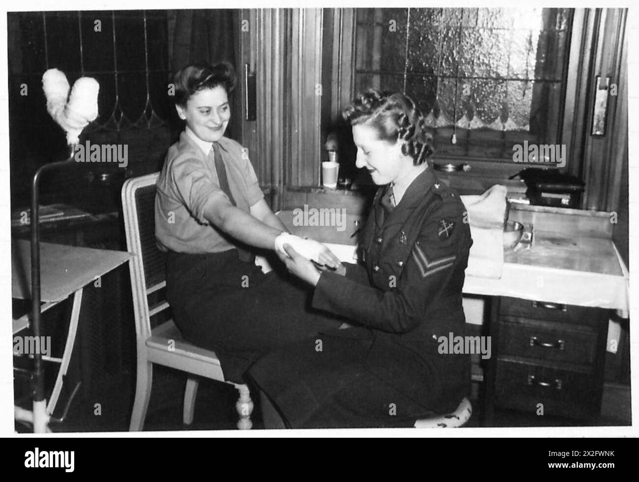 A.T.S. IN BRUSSELS - Cpl Stead, who is a Medical Orderly, at work in ...