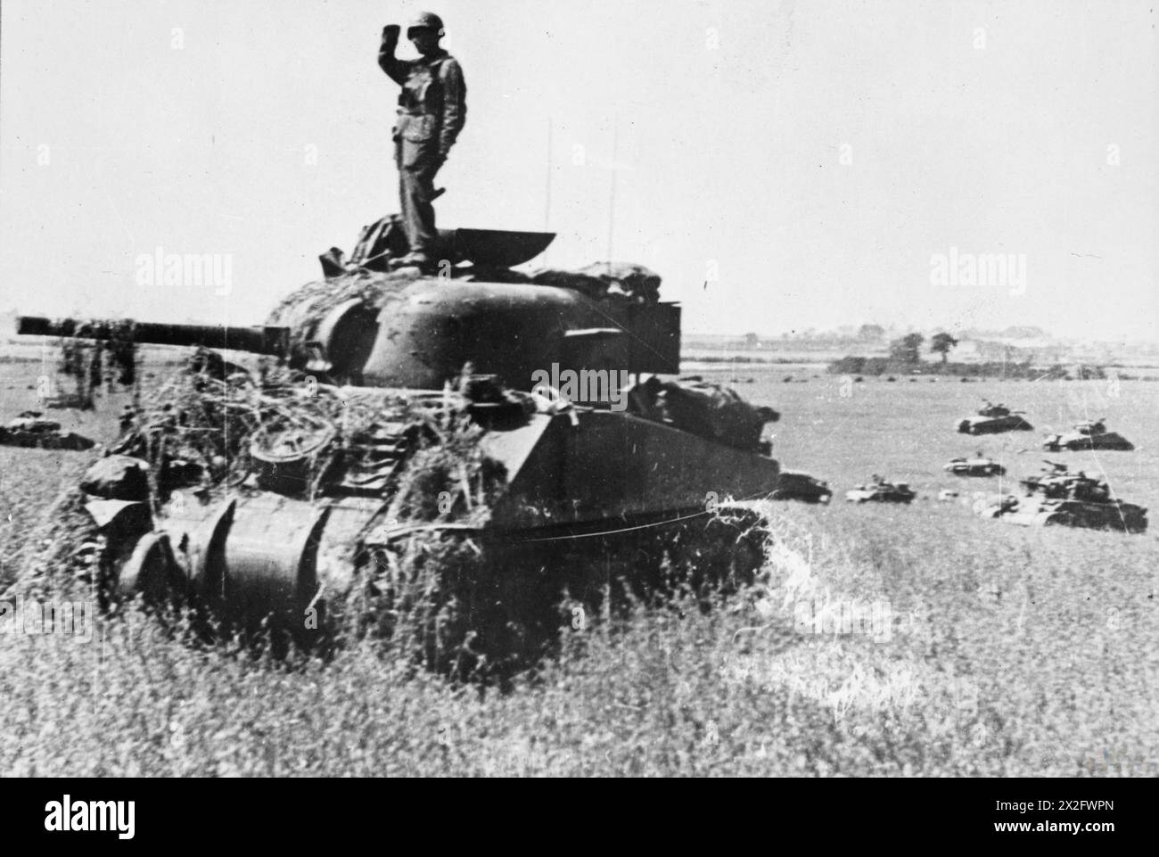 Squadron of Sherman tanks from the 10th Armored Cavalry Brigade, 1st ...
