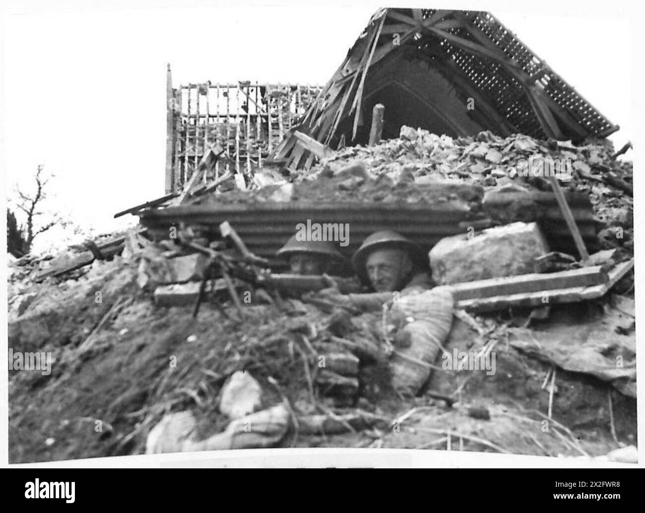 IN A FRONT LINE POSITION - Rifleman A. Stead of Bradford, Yorks, and ...