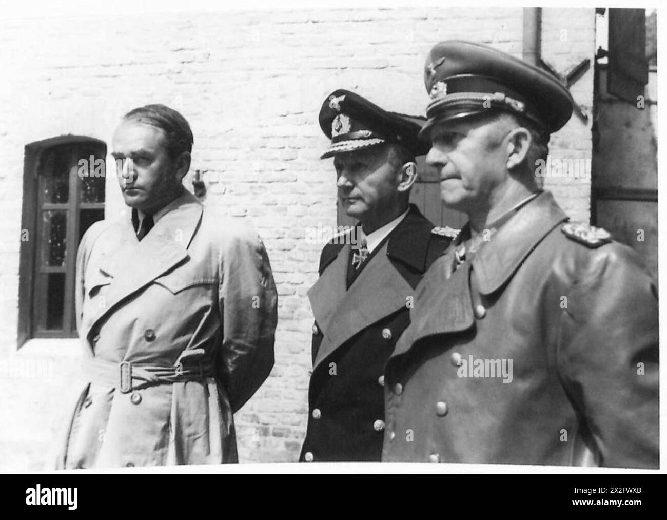 Dr. Speer, Admiral Doenitz, and Colonel General Jodl are pictured after ...