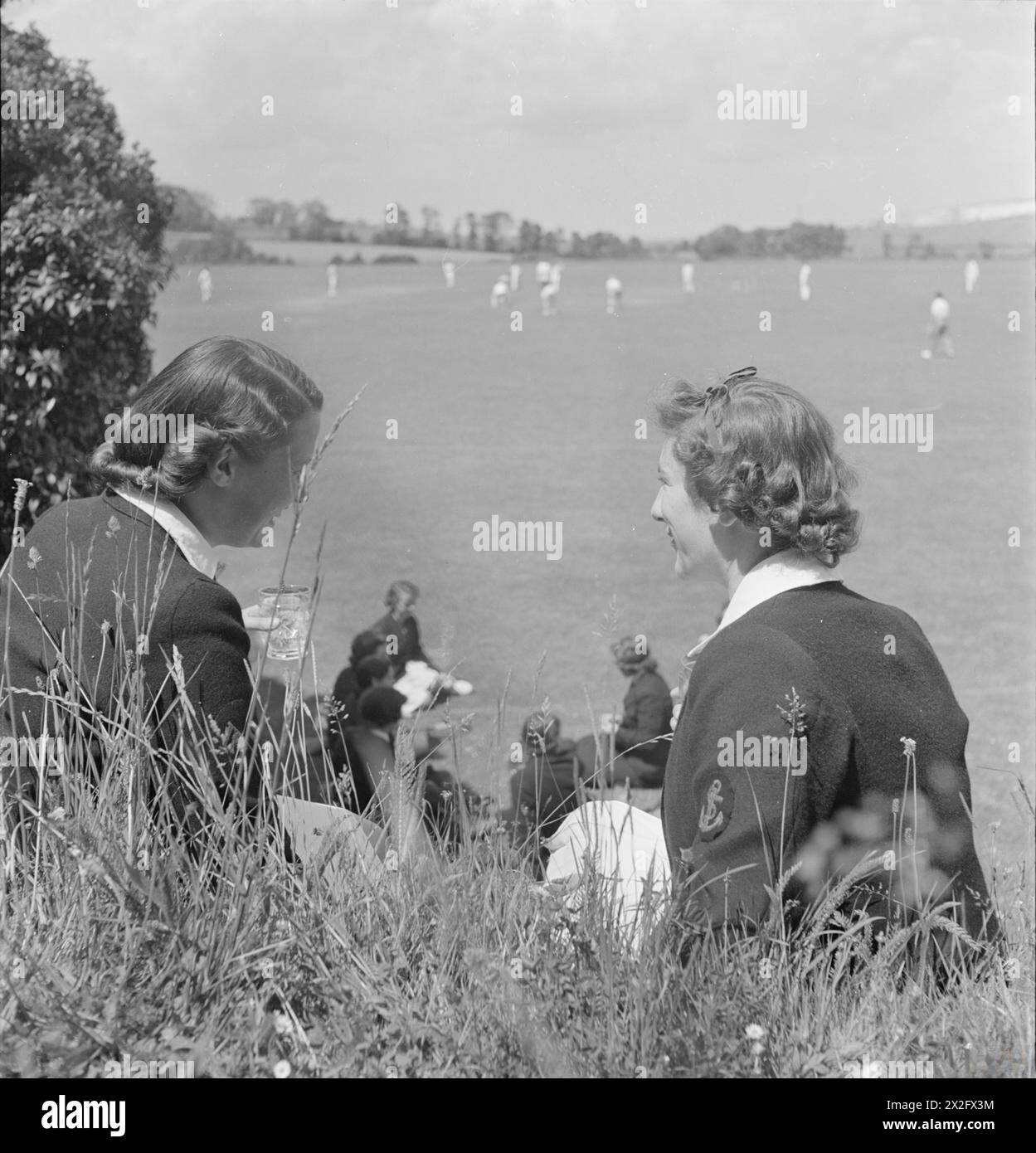 WOMEN'S ROYAL NAVAL SERVICE. - Wrens watching a cricket match between ...