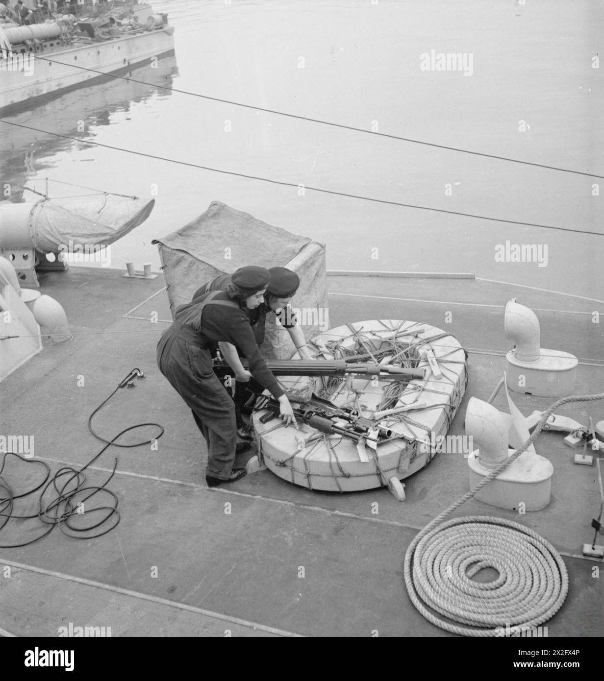 Maintenance Wrens of the Women's Royal Naval Service maintain small ...