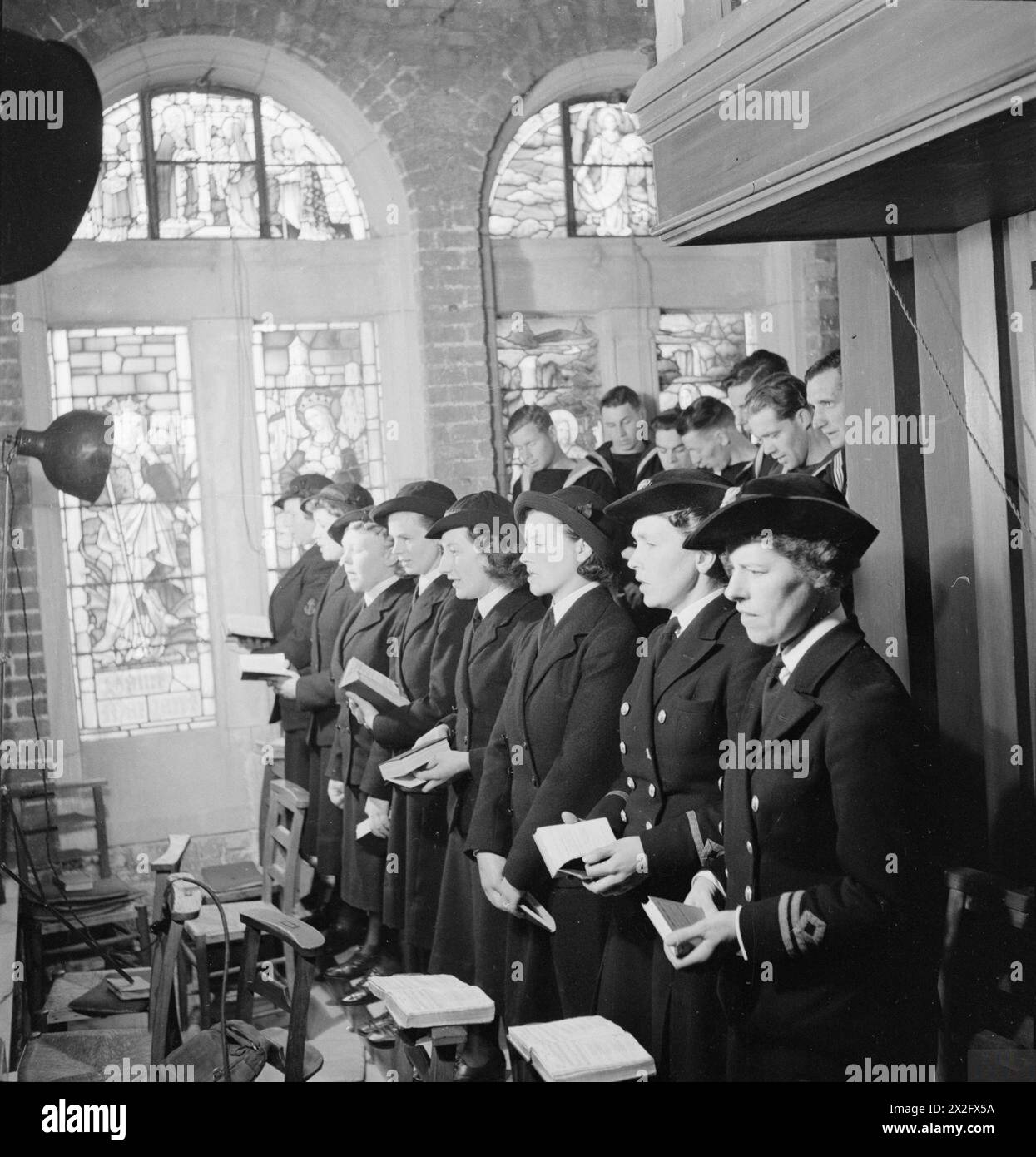 WOMEN'S ROYAL NAVAL SERVICE. - Wrens and Sailors worshiping together ...