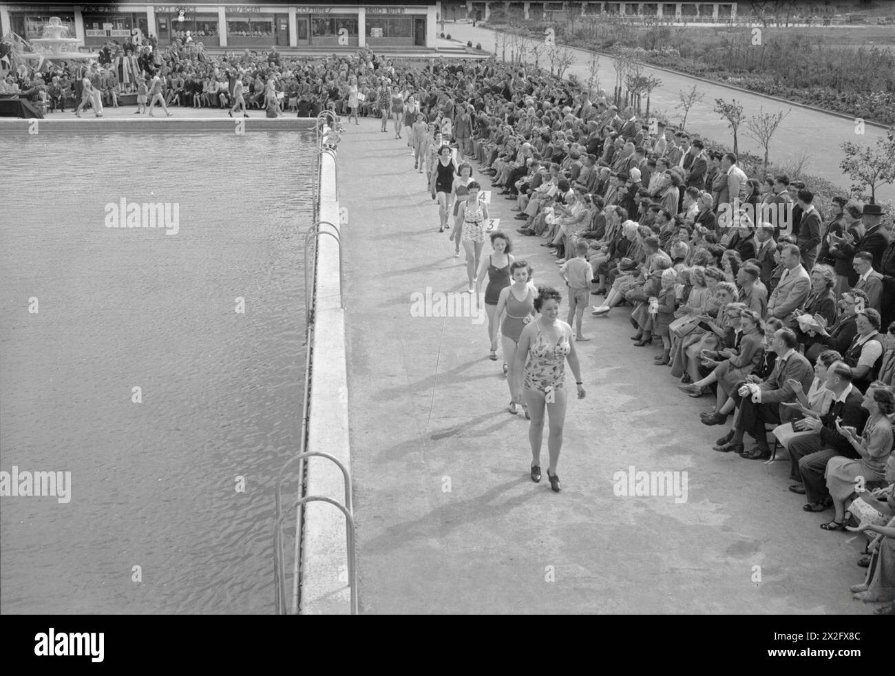 In 1945, women participate in a parade contest at Butlin's Holiday Camp ...