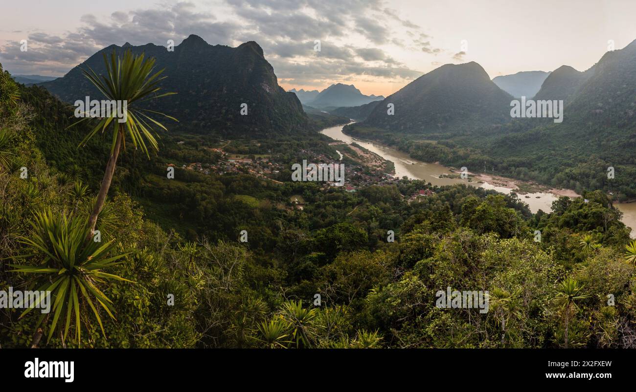 Evening aerial view of Muang Ngoi Neua village and Nam Ou river from ...