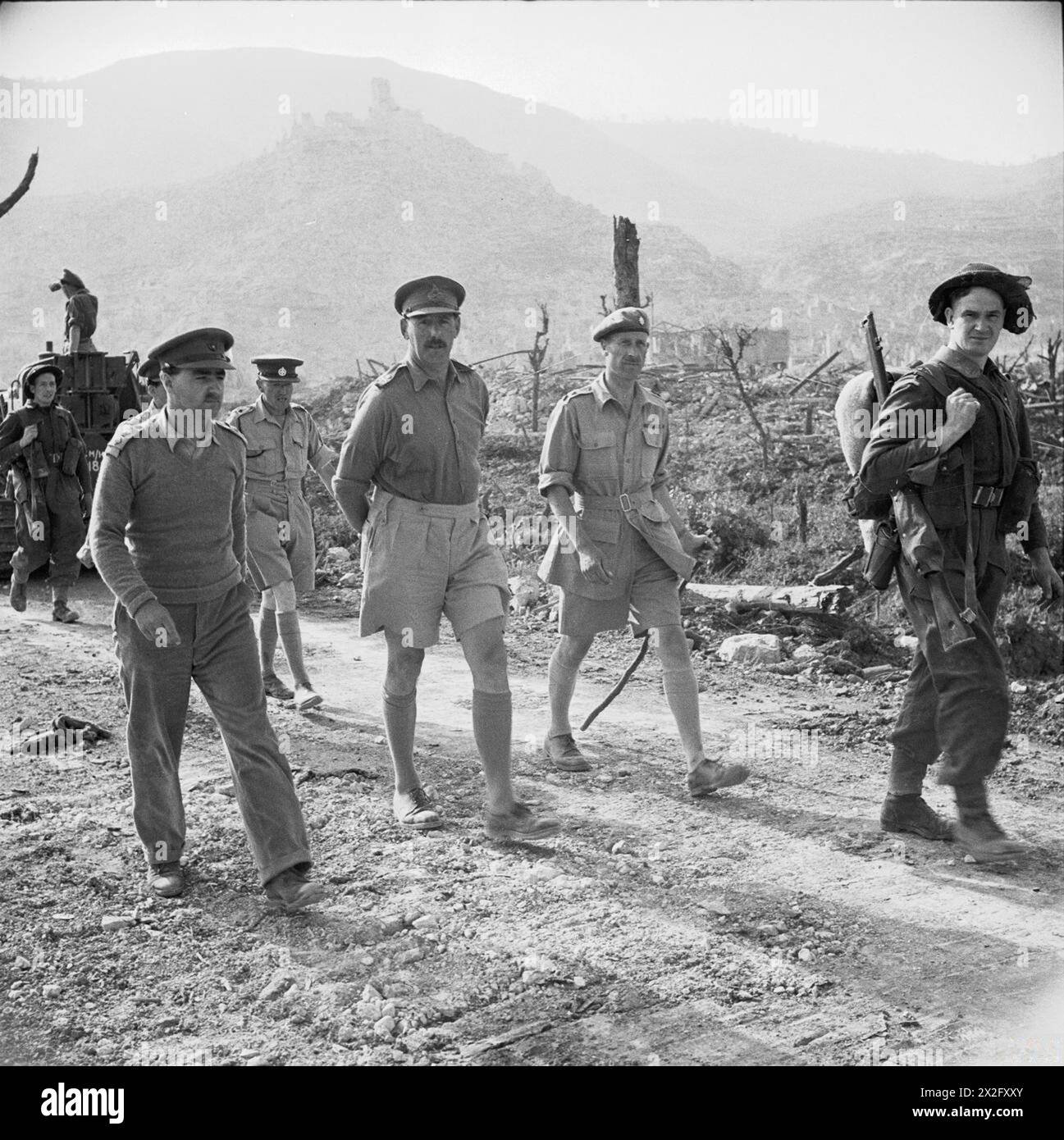 General Sir Oliver Leese, commander of the British 8th Army, walks ...