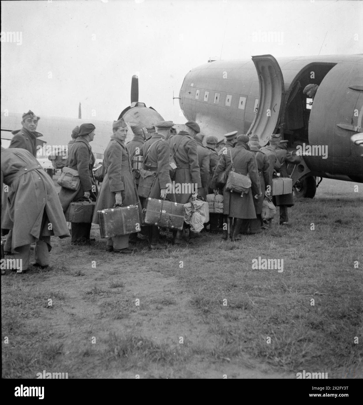 French and Belgian former prisoners of war board a Dakota aircraft of ...