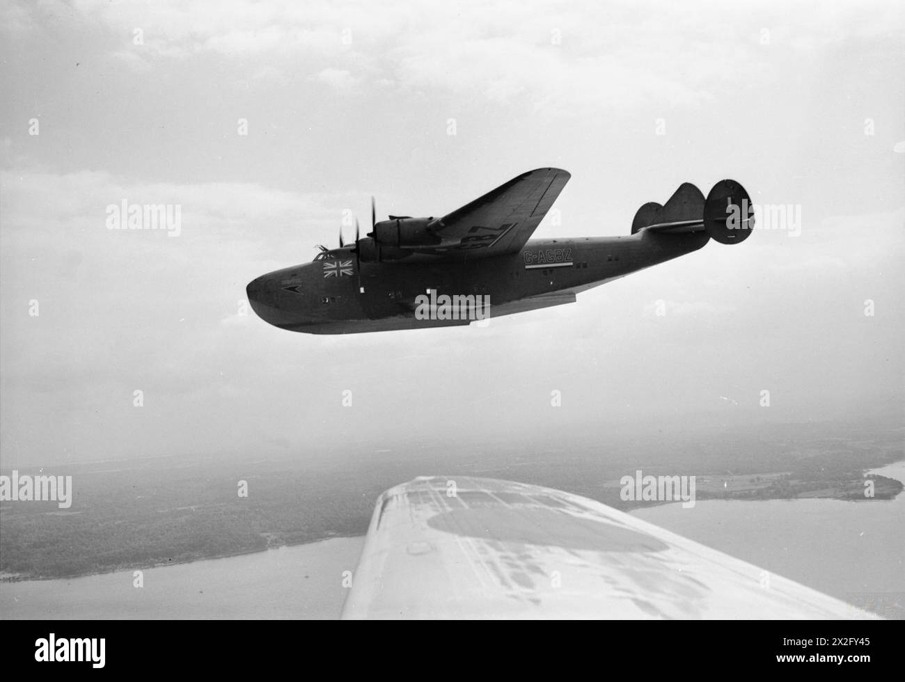 Between 1940 and 1945, BOAC Boeing 314A Clipper G-AGBZ 'Bristol' flies ...