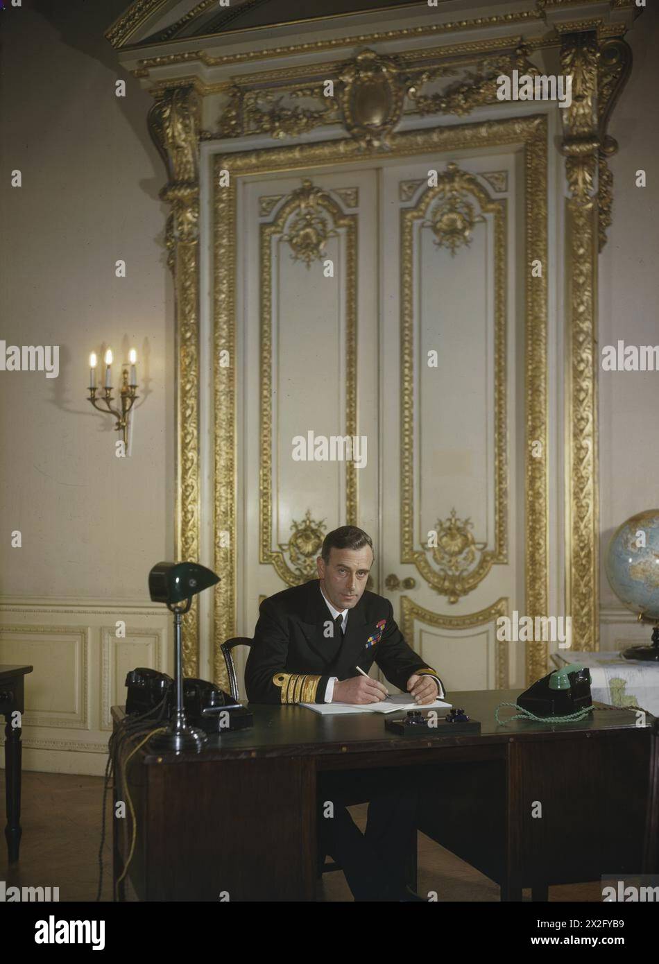 ADMIRAL OF THE FLEET EARL MOUNTBATTEN OF BURMA - Admiral Lord Louis Mountbatten sitting at his ...