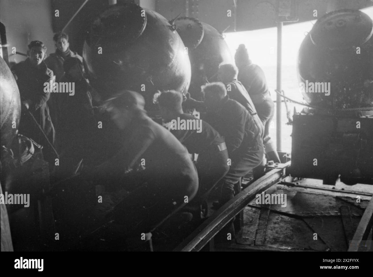 MINELAYING. 1942, ON BOARD A BRITISH MINELAYER, AT KYLE LOCHALSH ...