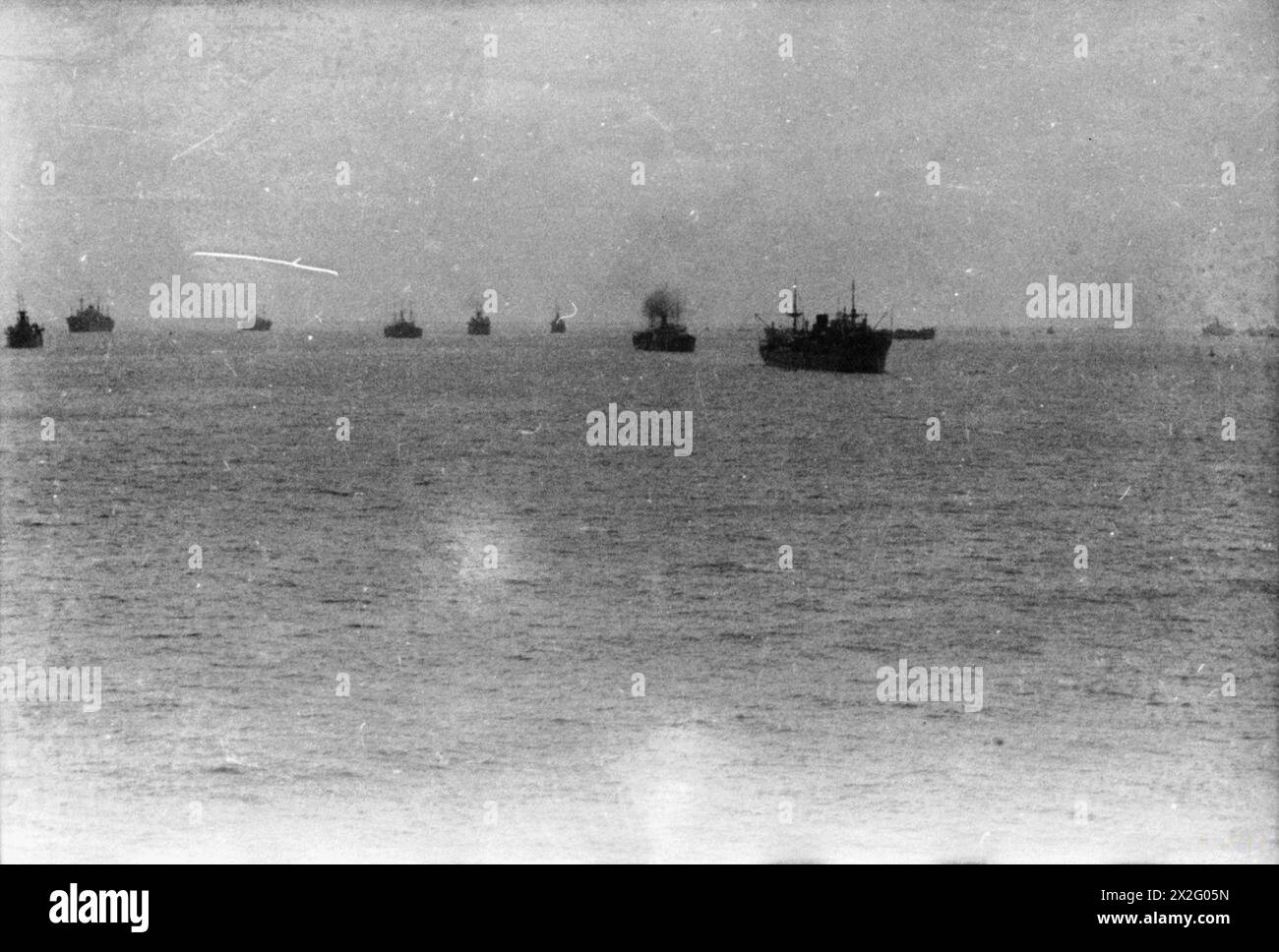 ON BOARD TROOP TRANSPORTS AT SEA. AUGUST 1941, ON AN AFRICAN TROOP ...