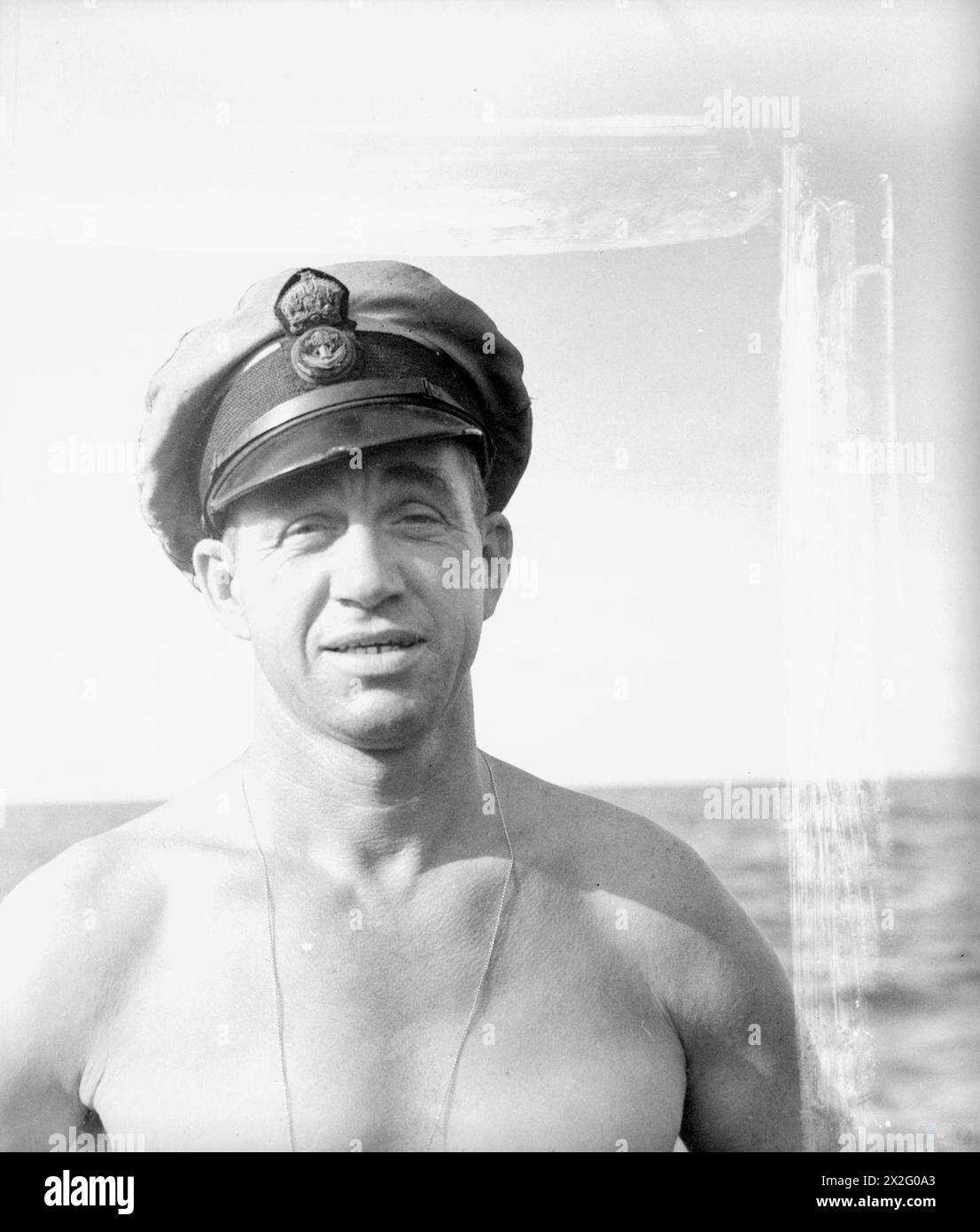 THE COMMANDING OFFICER AND COXSWAIN OF THE AUSTRALIAN ESCORT SLOOP HMAS ...