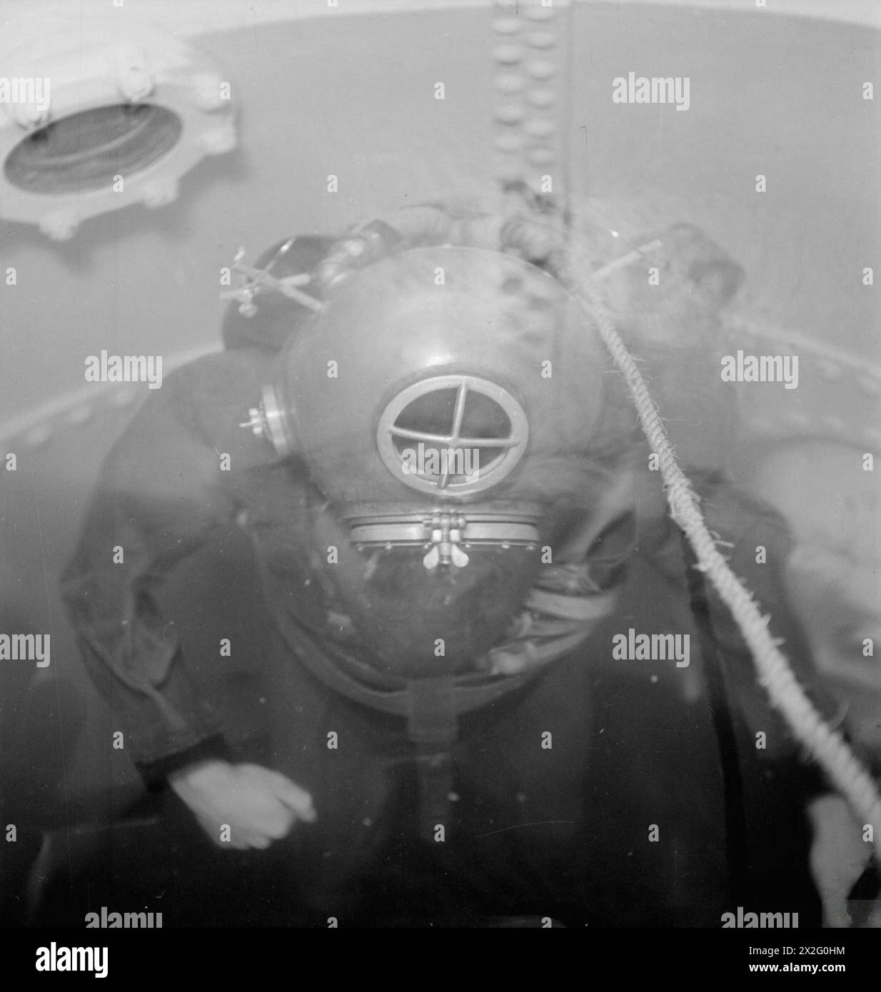 A diver is inside the wet pressure chamber at the Admiralty ...
