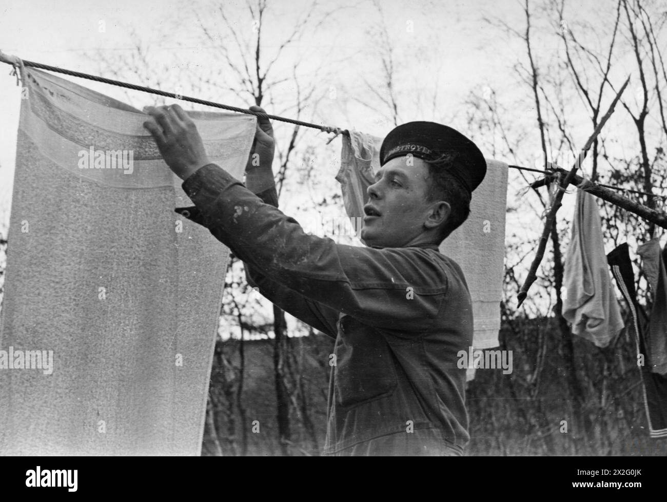 Sailors at Glen Holt training camp in Devonshire, 1940, perform various ...