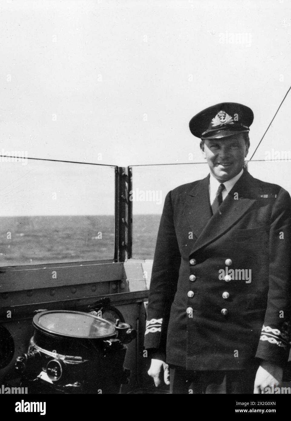 LIEUTENANT COMMANDER WILLIAMS. 1945, AT SEA. LIEUT CDR TREVOR M ...