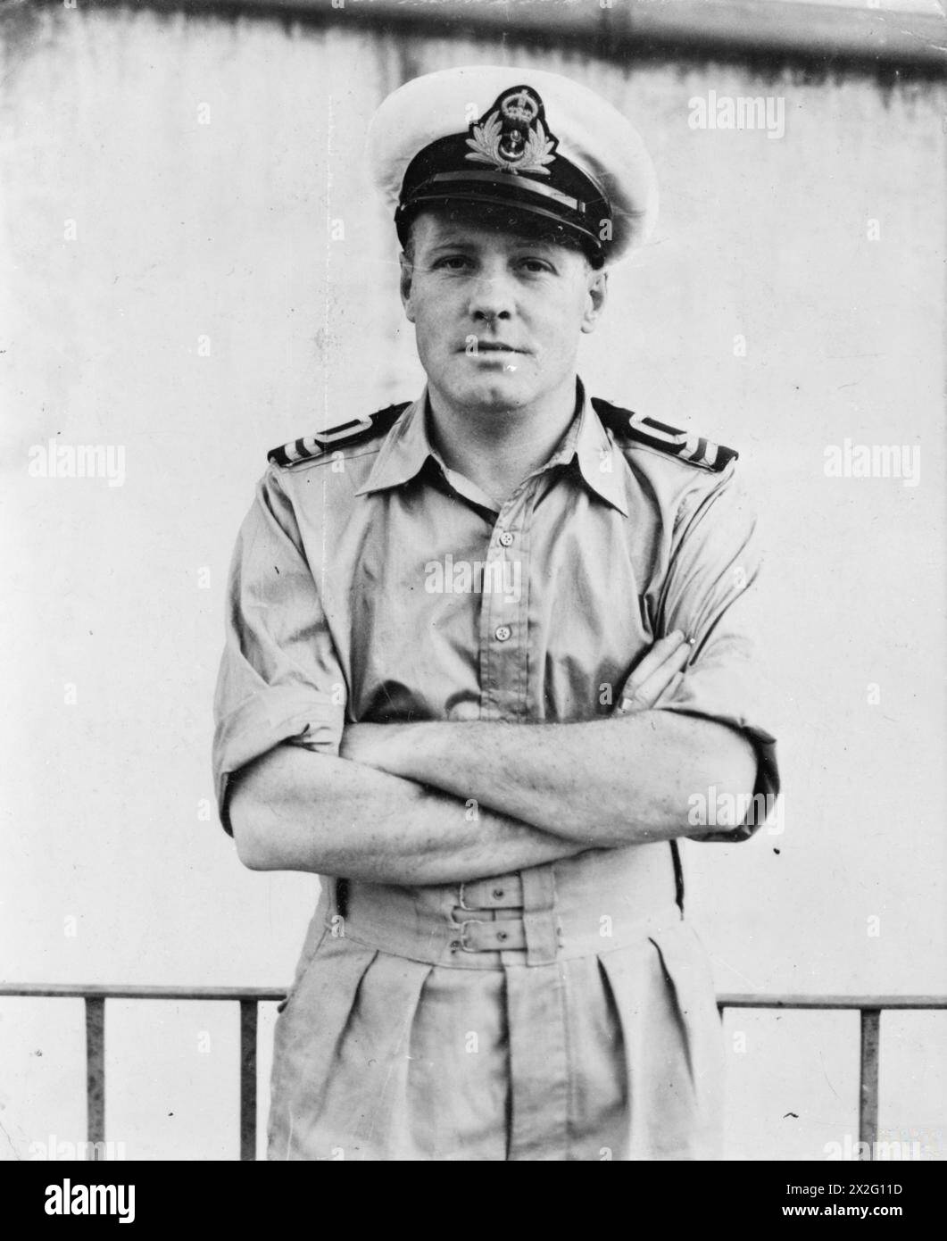 NAVY CAMERAMAN. 1942, AT SEA. LIEUTENANT S J BEADELL, RNVR, (SP), ONE ...