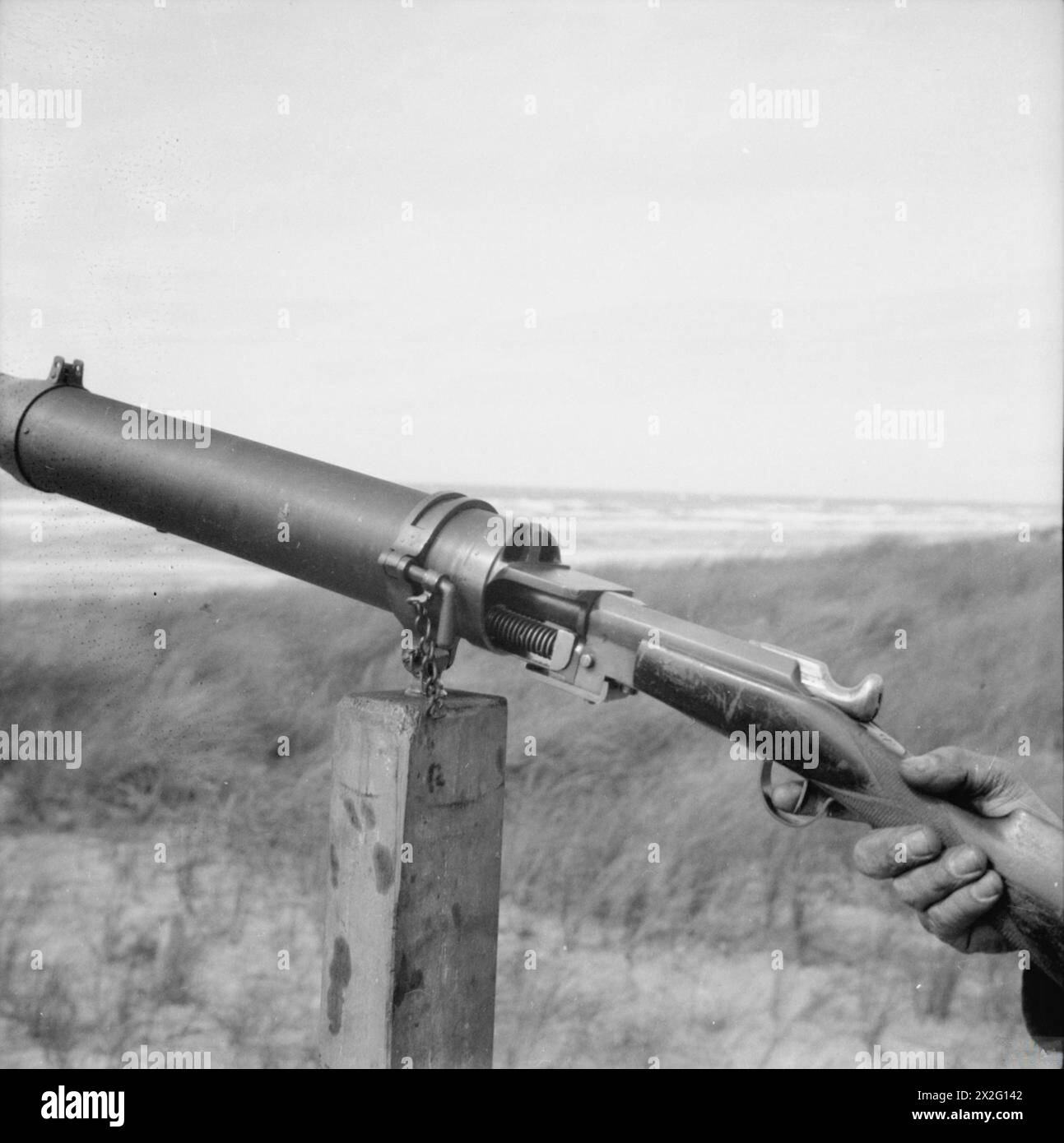 MEMBERS OF THE ROYAL MERCHANT NAVY AT FIRING PRACTICE DURING THEIR ANTI ...