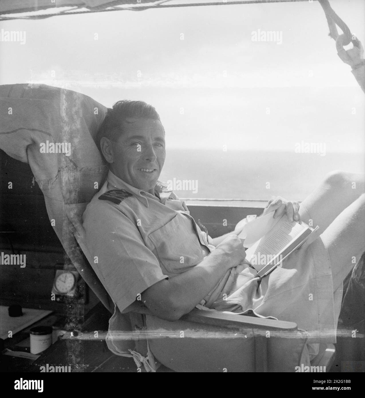 THE COMMANDING OFFICER AND COXSWAIN OF THE AUSTRALIAN ESCORT SLOOP HMAS ...