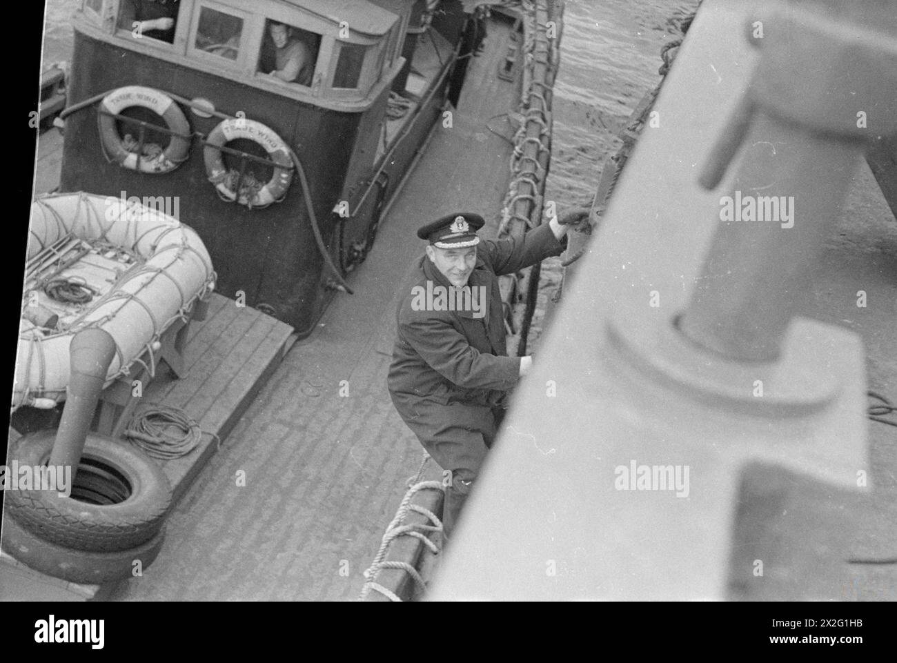 Convoy Commodore Commander Jackson boards MV Empire Unity, a merchant ...