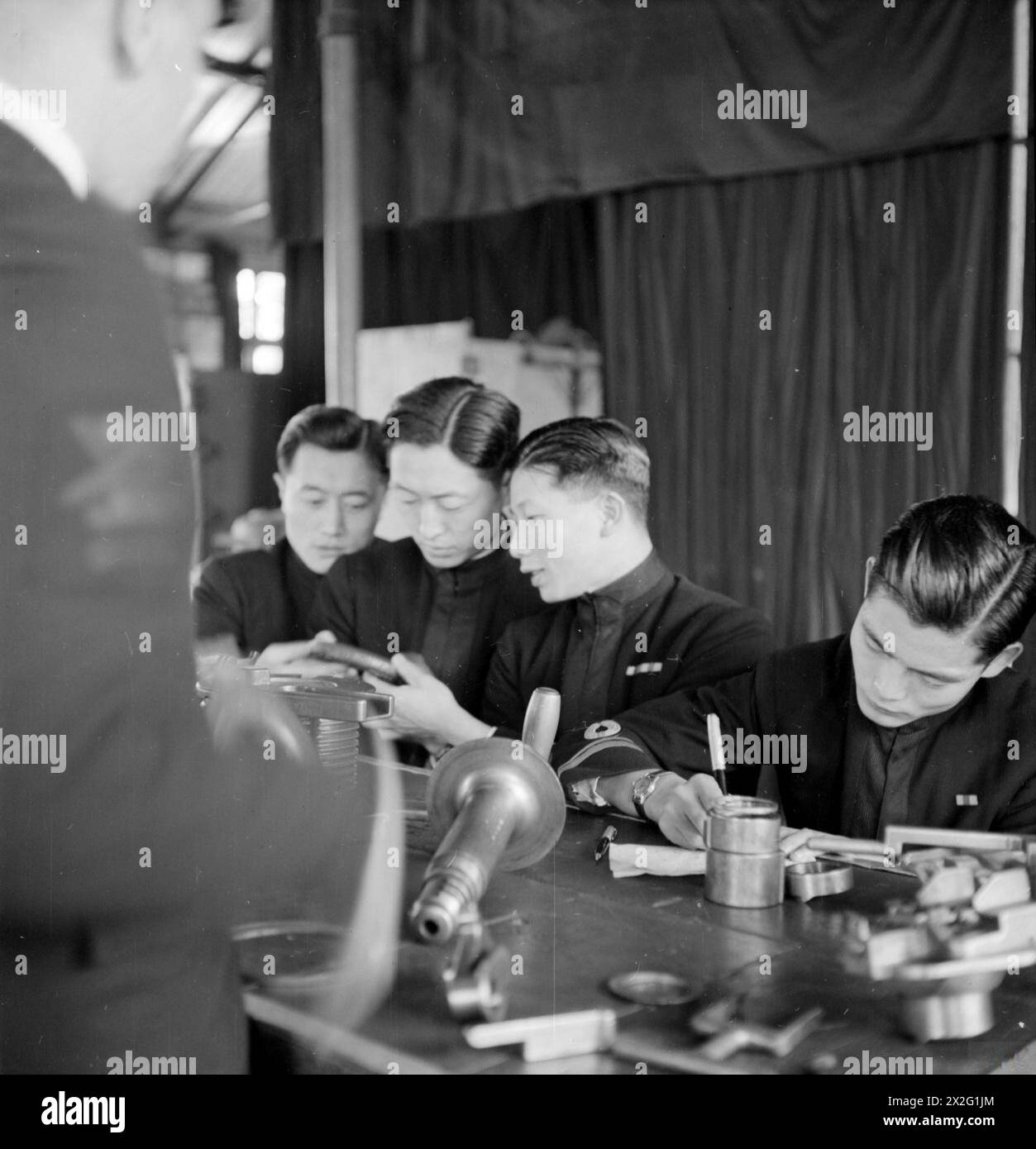 Chinese naval officers undergo part of their training course at Gunnery ...