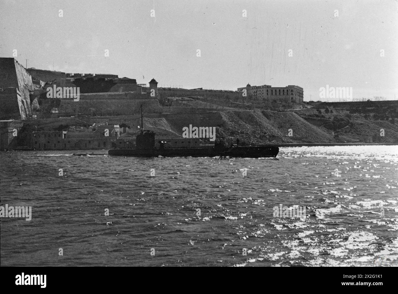 HMS Una returns to Malta on 4 February 1943 after submarine operations ...