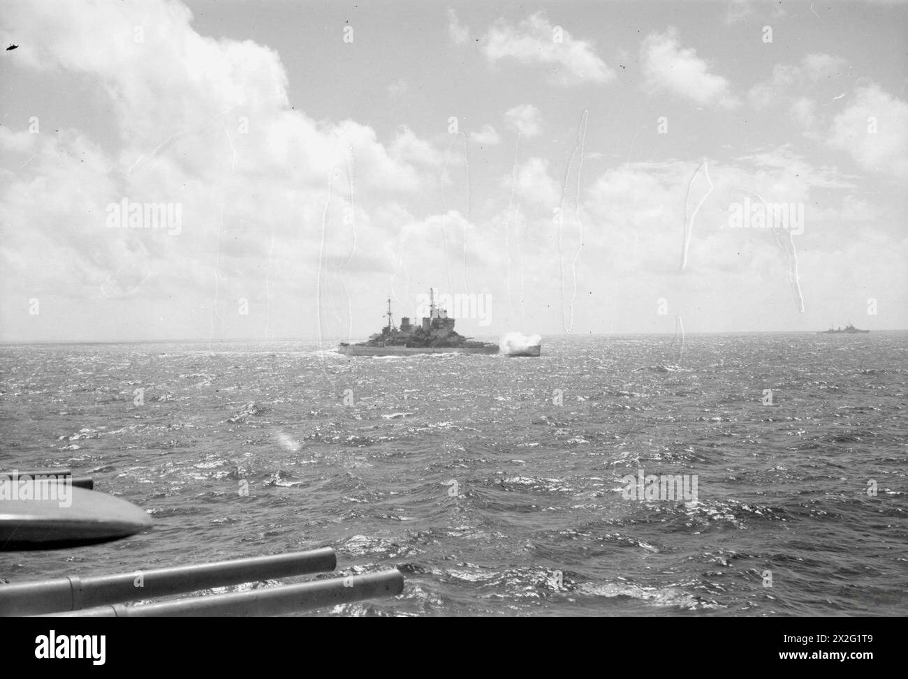 HMS Howe is visible from the flight deck of HMS Indomitable in August ...