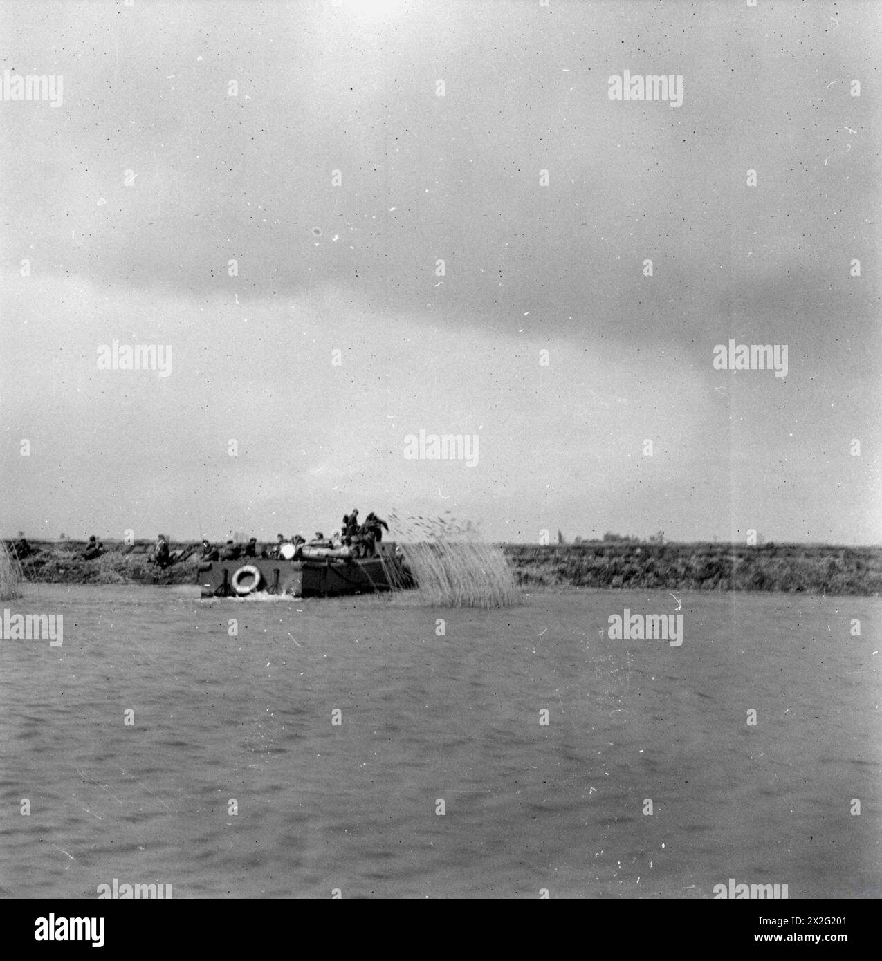 ROYAL MARINE COMMANDOS RAID IN FORCE ACROSS THE MAAS, APRIL 1945. - The ...