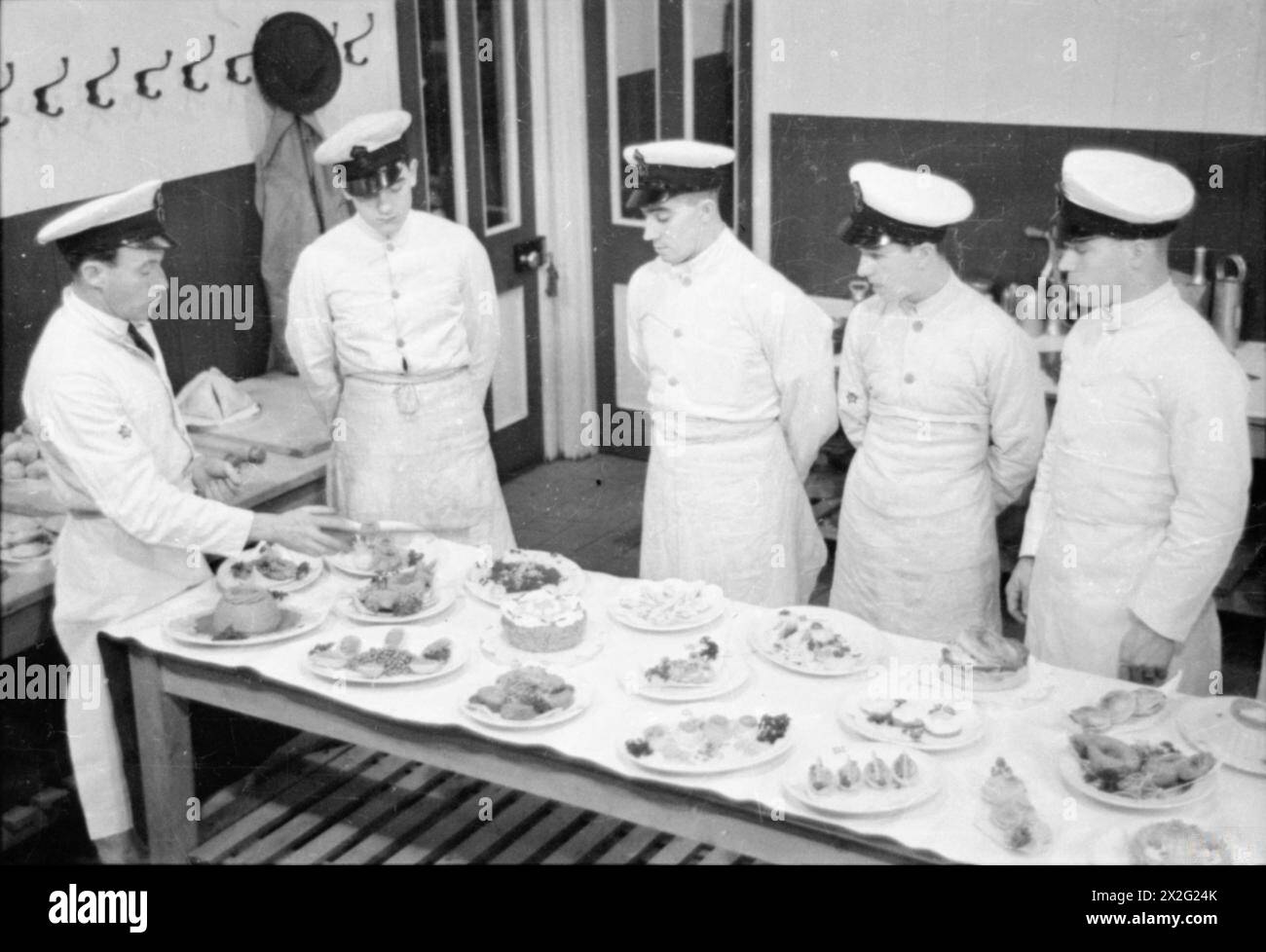 SCHOOL FOR NAVAL COOKS. 1940 ROYAL NAVAL BARRACKS, CHATHAM. AT THE ...