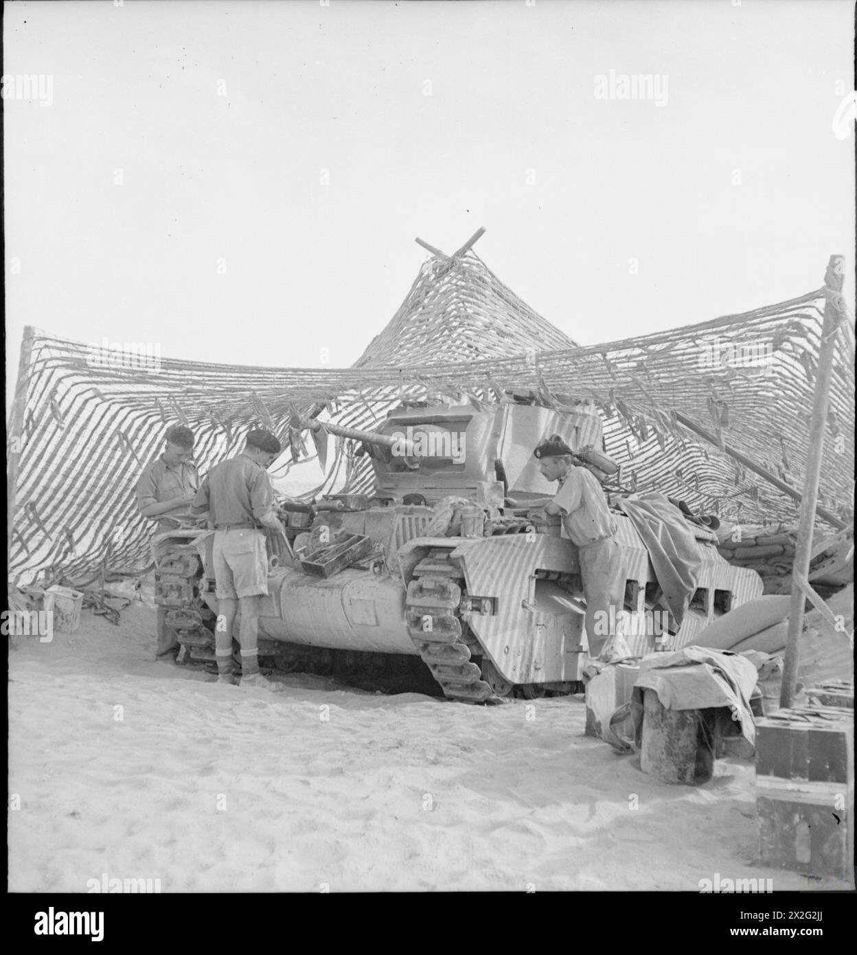 THE BRITISH ARMY IN NORTH AFRICA 1941 - A Matilda tank under camouflage ...