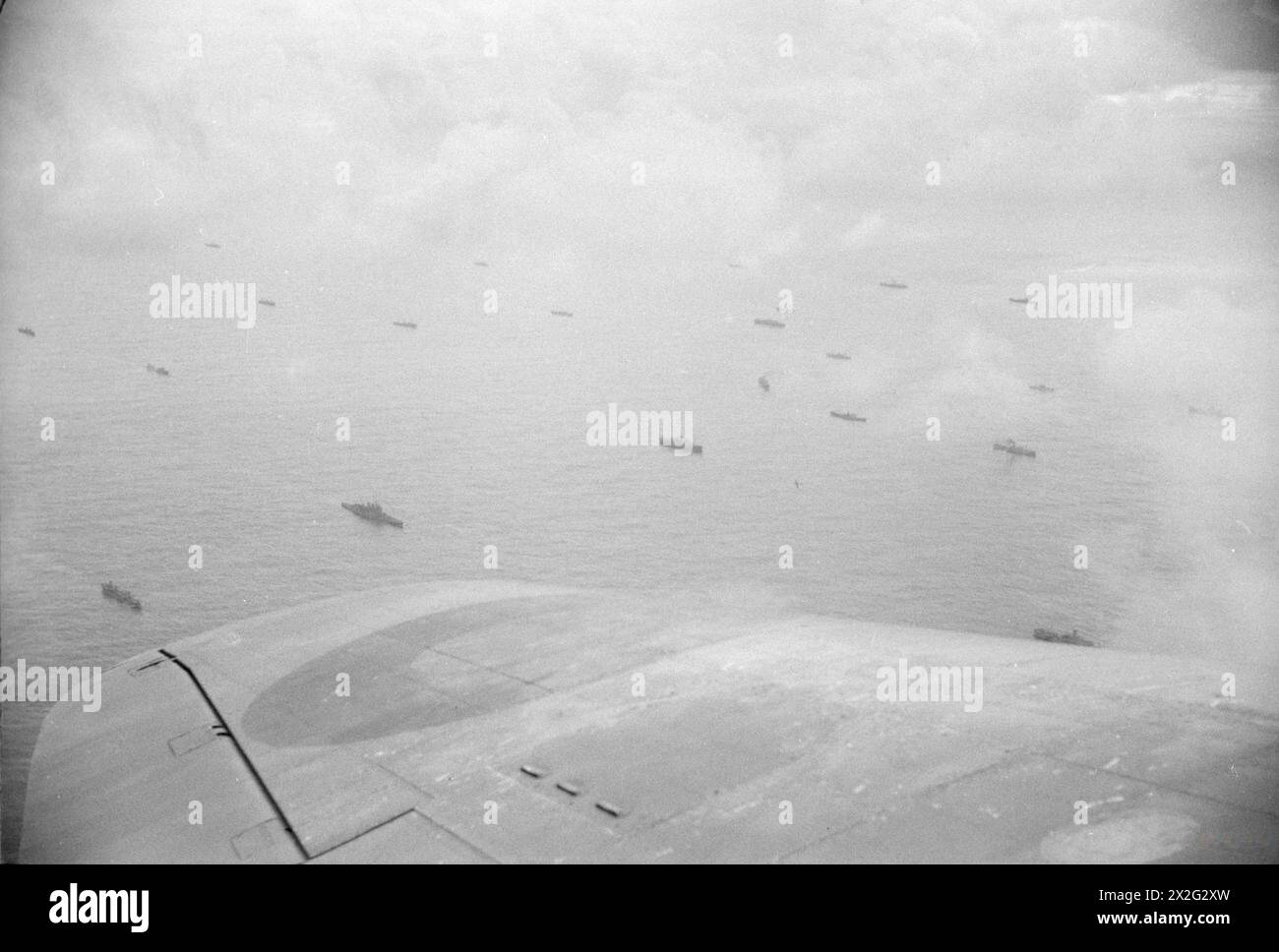 Fleet Air Arm aircraft patrol over a convoy in April 1941, providing ...