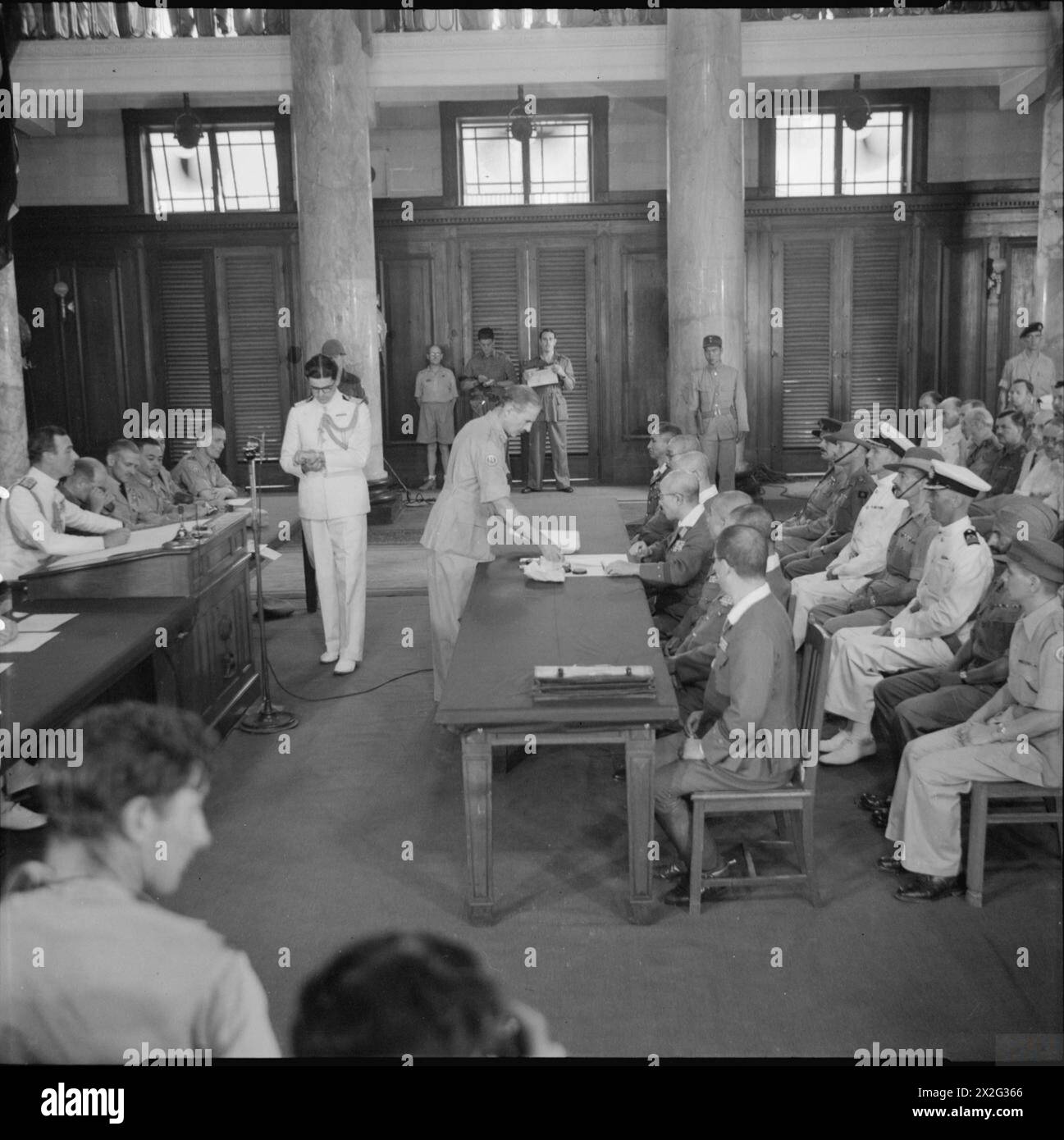 SIGNING JAPANESE SURRENDER AT SINGAPORE - General Itagaki signing the ...