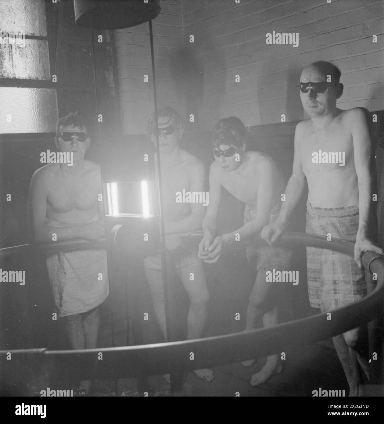 Coal miners in a Midlands colliery, England, 1944, receive sun ray ...