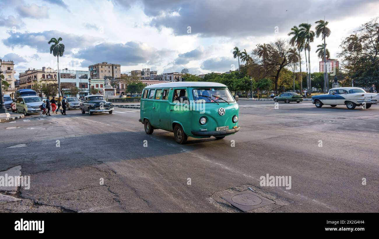 Vintage old VW Volkswagen van driving on city street Stock Photo - Alamy