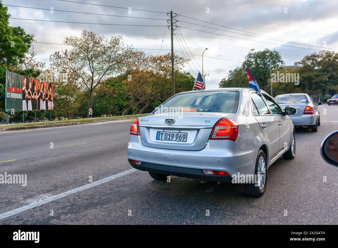 Car with flags hi-res stock photography and images - Alamy
