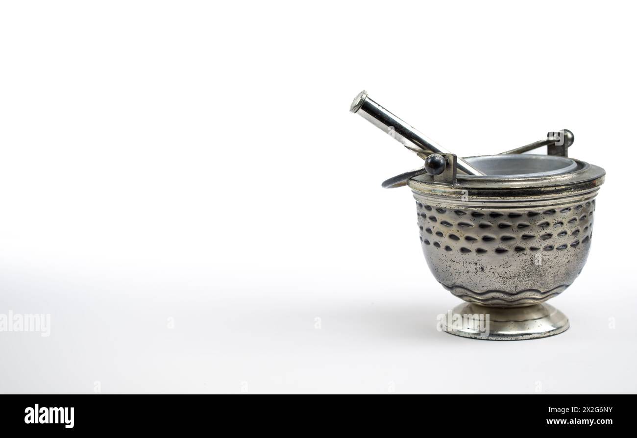 A decorated liturgical metal container with sprinkler, used in the ...