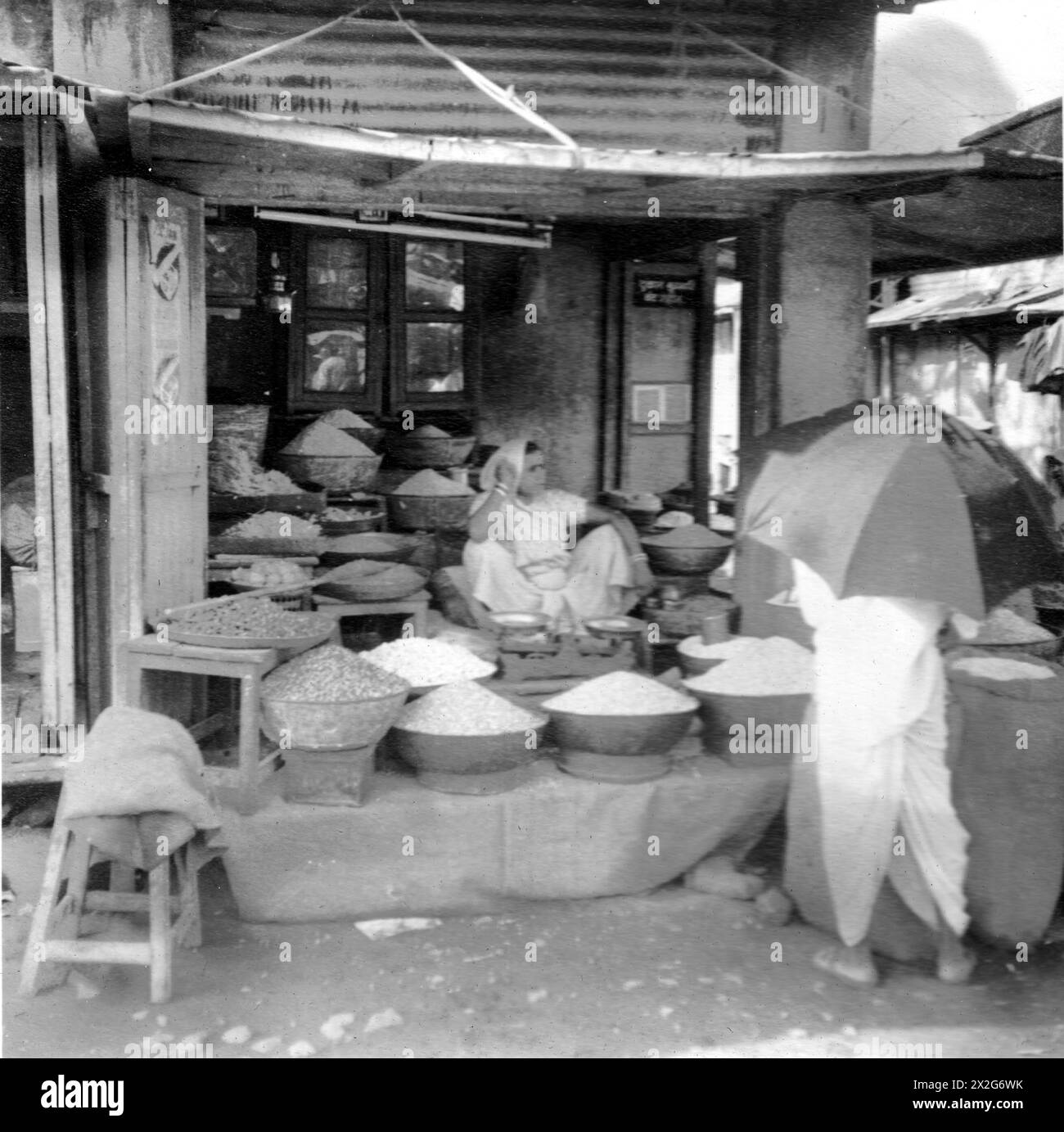 Shop keeper - Kolkata (Calcutta), India, 1950s Stock Photo - Alamy